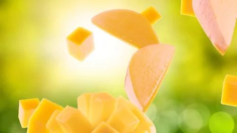 Mango with Slices Falling on Garden Back... | Stock Video | Pond5