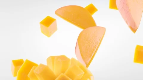 Mango with Slices Falling on White Backg... | Stock Video | Pond5