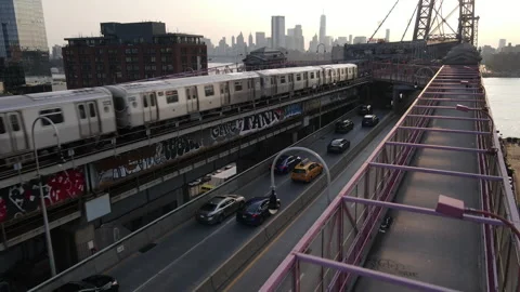 Manhattan bound J train at sunset Willia... | Stock Video | Pond5