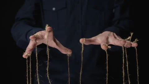 Manipulator hands with ropes on fingers.... | Stock Video | Pond5