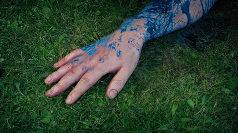 Man's Arm With Blue Alien Goo On The Gra... | Stock Video | Pond5