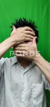 A Man's Expression Reflecting Apprehension and Unease with his Fearful ...