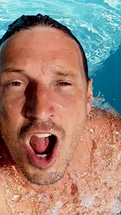 A man's face drowning in a swimming pool... | Stock Video | Pond5