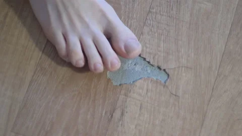 man's foot steps on a hole in the floor,... | Stock Video | Pond5