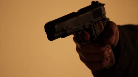 Man's Hand Aims a 1911 .45 Caliber Pisto... | Stock Video | Pond5
