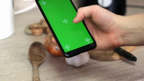Man's hand browsing recipe on smartphone... | Stock Video | Pond5