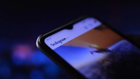 man's hand holding and scrolling instagr... | Stock Video | Pond5