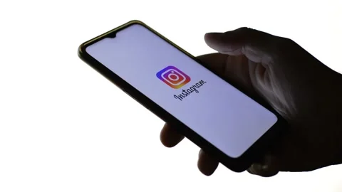 man's hand with instagram icon logo on t... | Stock Video | Pond5