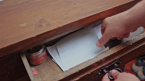 A man's hand opens the drawer of an old ... | Stock Video | Pond5