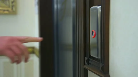 Man's hand presses a lift button. Man pr... | Stock Video | Pond5