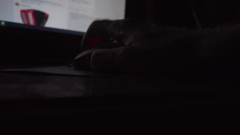 Man's hand scrolling a computer mouse in... | Stock Video | Pond5