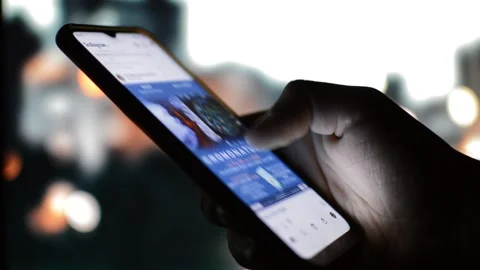 man's hand scrolling instagram app on hi... | Stock Video | Pond5