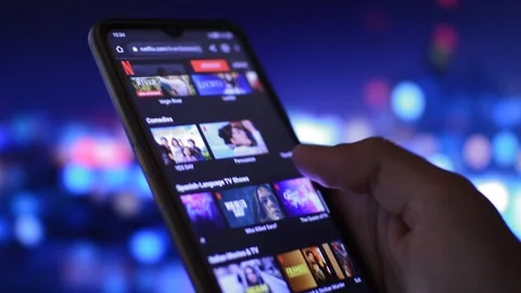 man's hand scrolling netflix streaming a... | Stock Video | Pond5