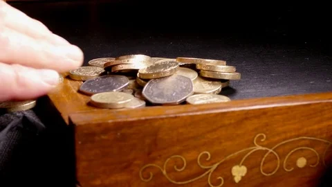Man’s hand sliding sterling coins from... | Stock Video | Pond5