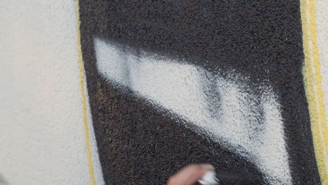 Man's Hand Spraying Black Colour over Wh... | Stock Video | Pond5