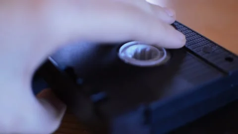 man's hand take vhs film tape for movie.... | Stock Video | Pond5