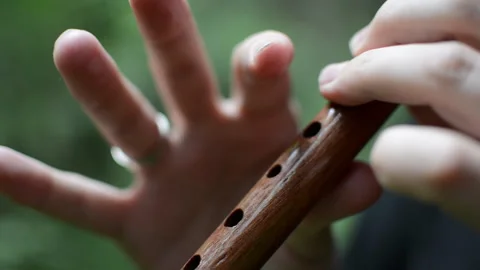 Play A Flute Stock Videos – Royalty-Free HD & 4K Videos