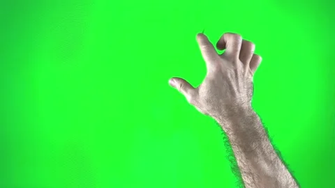 a man's strong hairy hand on a green chr... | Stock Video | Pond5