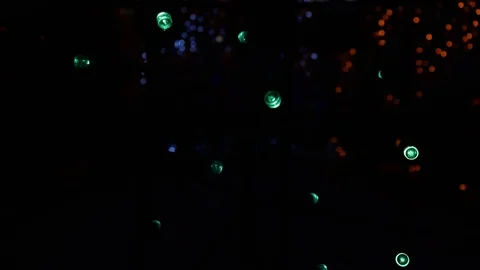Many bright lights on a black background | Stock Video | Pond5