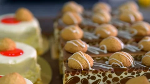 Many cakes on the table on the bakery fa... | Stock Video | Pond5