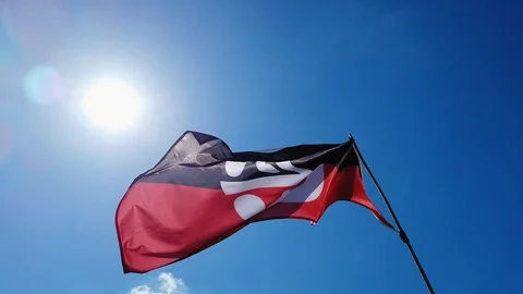Maori Flag waving in the wind in slow mo... | Stock Video | Pond5