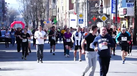 Marathon a crowd of people on the street... | Stock Video | Pond5