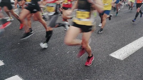 Marathon start finish line with confetti... | Stock Video | Pond5