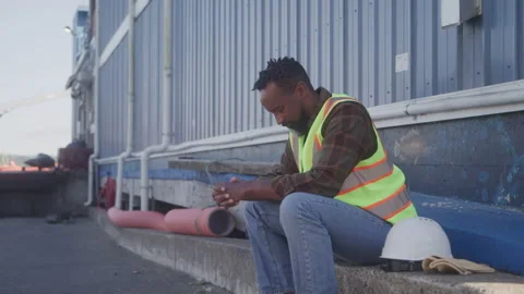 Marina Worker Sitting Down by a Hard Hat... | Stock Video | Pond5