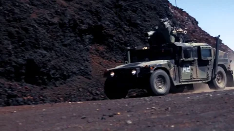 Marines firing from Humvee armored vehic... | Stock Video | Pond5