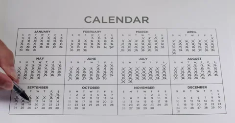 Marking Dates On A Yearly Calendar | Stock Video | Pond5