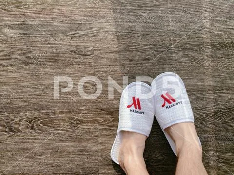 Marriott Bonvoy Slippes on hotel floor Stock Image #162440176