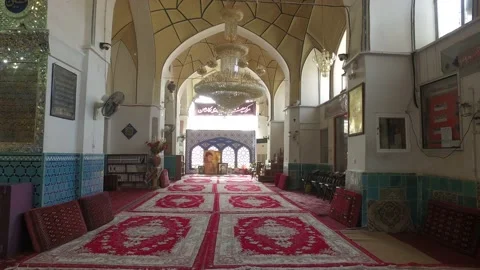 Martyrs portraits in hasan ibn musa ibn ... | Stock Video | Pond5