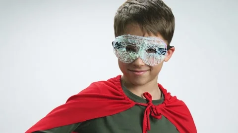 The masked boy looks into the camera. A ... | Stock Video | Pond5