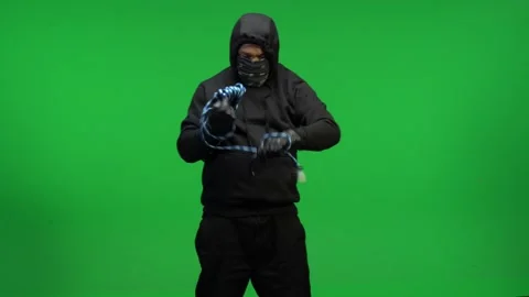 Masked hooded man with rope in green scr... | Stock Video | Pond5