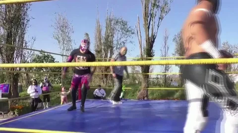Masked wrestlers perform Lucha Libre sho... | Stock Video | Pond5