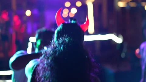 Masquerade party. Girl dancing at hell n... | Stock Video | Pond5