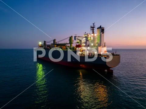 A massive cargo ship wood chips carrier in the sea, aerial view Stock ...