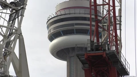 Massive condo construction cranes dwarf ... | Stock Video | Pond5