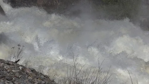 Massive flooding and raging river as tow... | Stock Video | Pond5