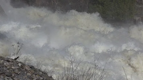 Massive flooding and raging river as tow... | Stock Video | Pond5