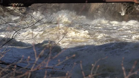 Massive flooding and raging river as tow... | Stock Video | Pond5