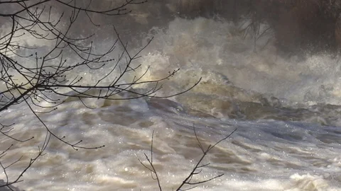 Massive flooding and raging river as tow... | Stock Video | Pond5