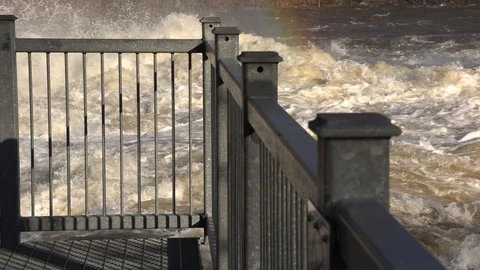 Massive flooding and raging river as tow... | Stock Video | Pond5