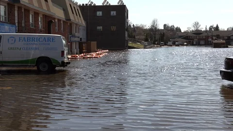 Massive flooding and raging river as tow... | Stock Video | Pond5