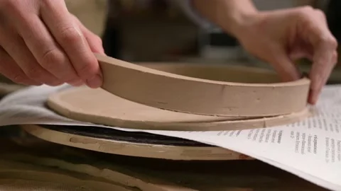 Master ceramist works in pottery studio.... | Stock Video | Pond5