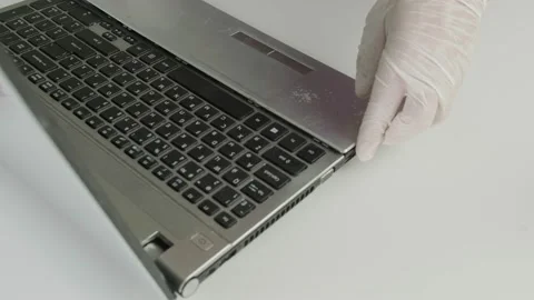 The master disassembles the laptop case... | Stock Video | Pond5
