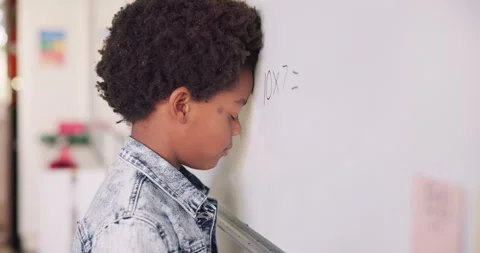Math class, sad child at board for educa... | Stock Video | Pond5