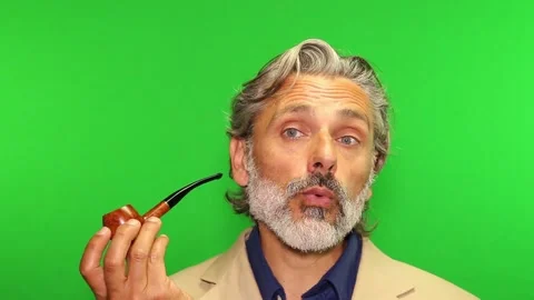mature pipe smoker greenscreen | Stock Video | Pond5