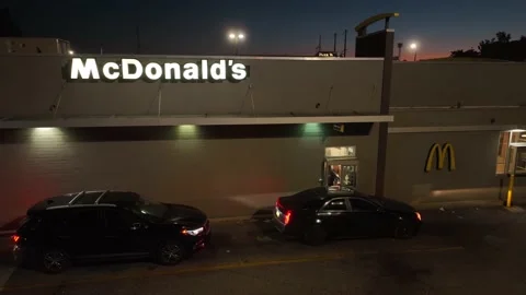 McDonalds drive through at night. Cars l... | Stock Video | Pond5