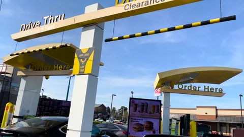 McDonalds drive thru cars at menu order ... | Stock Video | Pond5